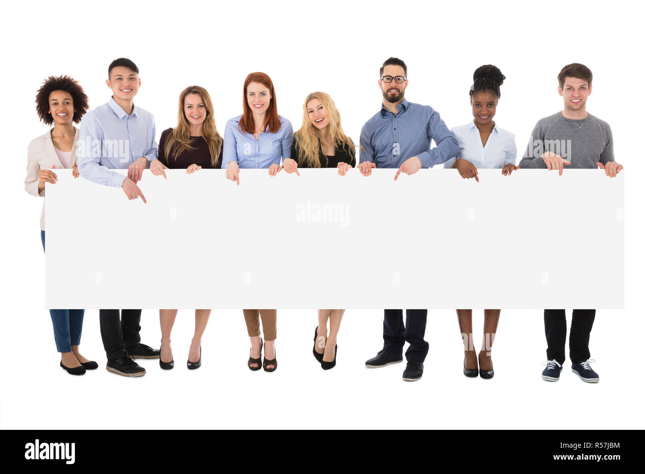 Group Of College Students Holding Long Billboard Stock Photo - Alamy