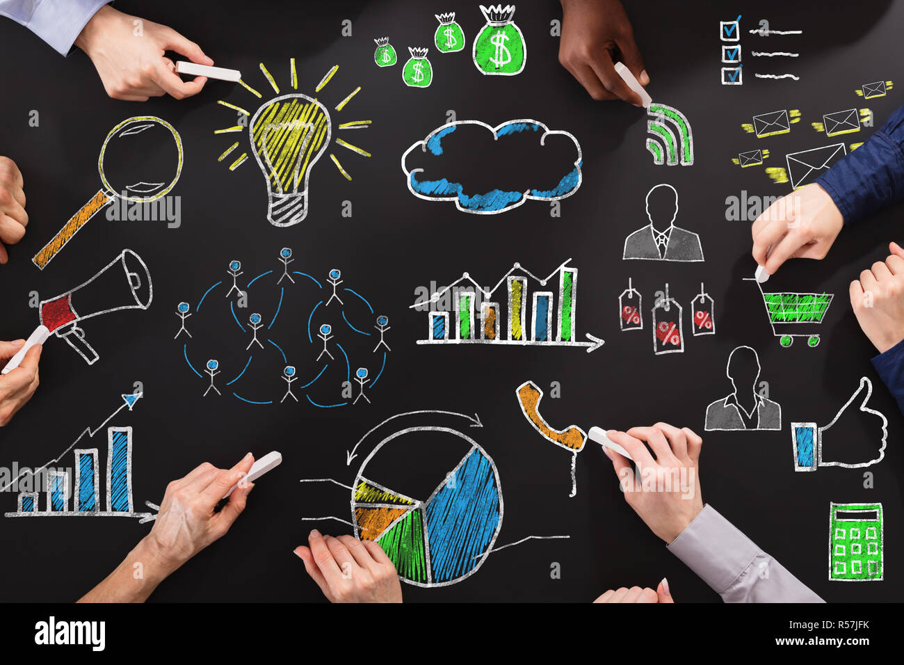 Hands Drawing Business Strategy With Chalk On Blackboard Stock Photo ...