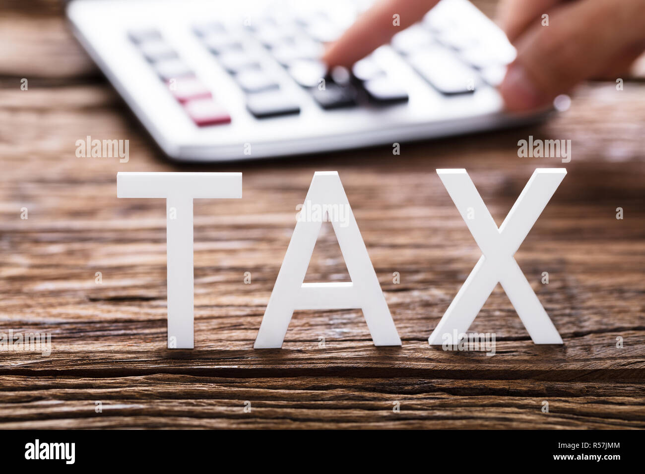 Close-up Of White Tax Word Stock Photo - Alamy