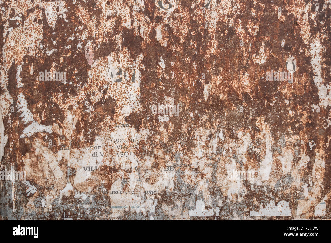 Rusty background with torn pieces of paper Stock Photo - Alamy