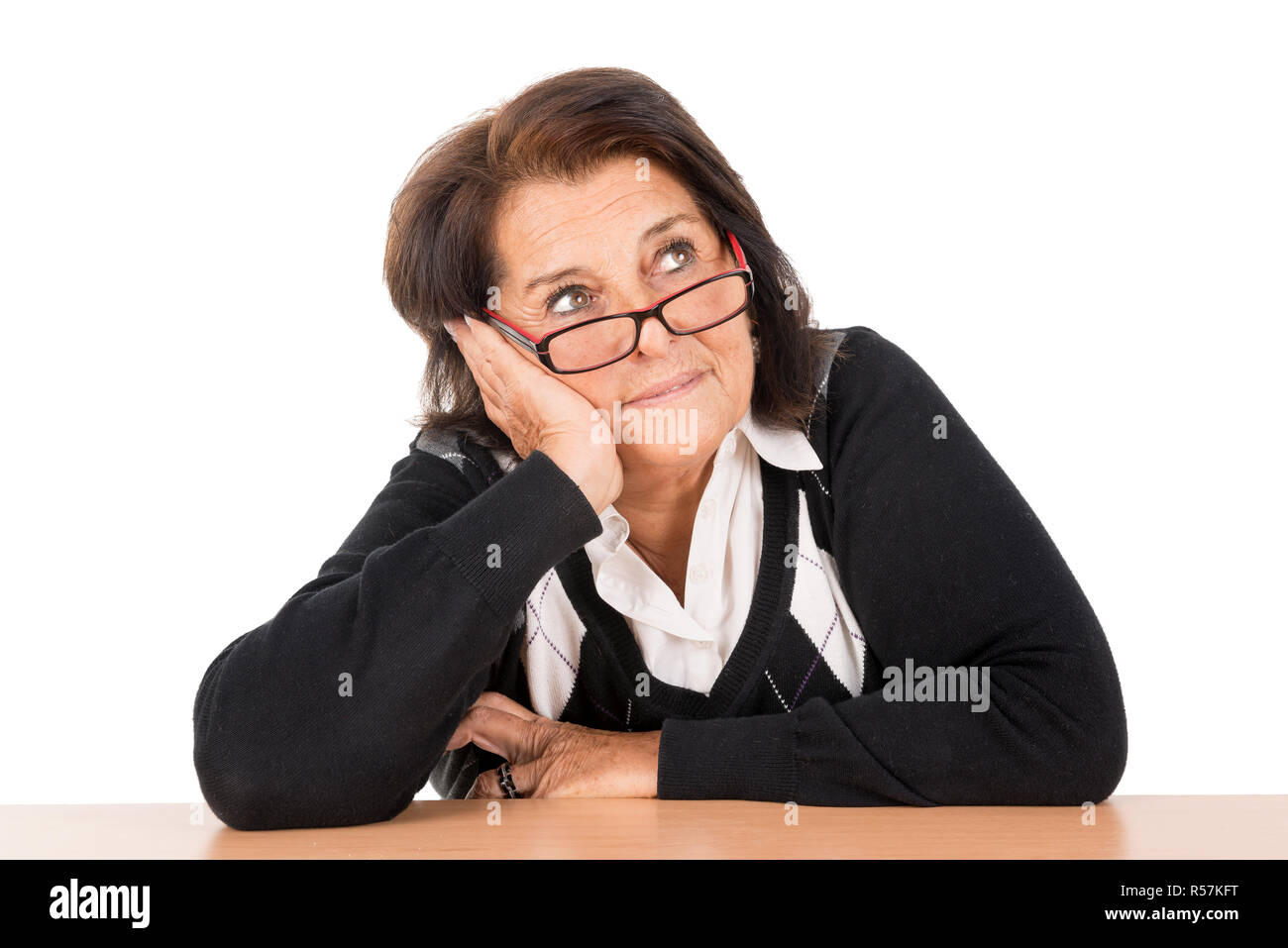 Senior woman thinking Stock Photo - Alamy