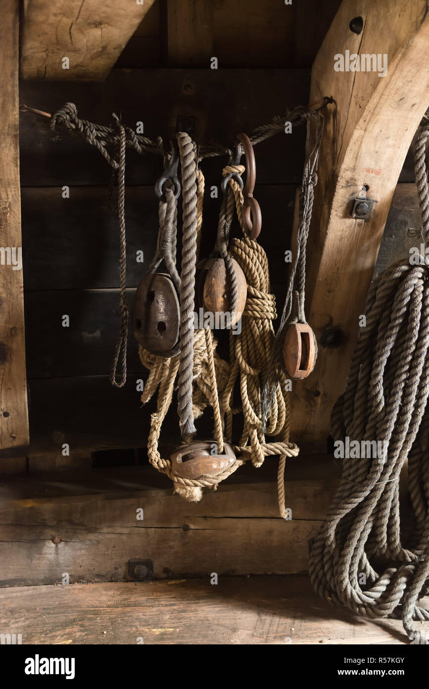 Ancient wooden pulleys hi-res stock photography and images - Alamy