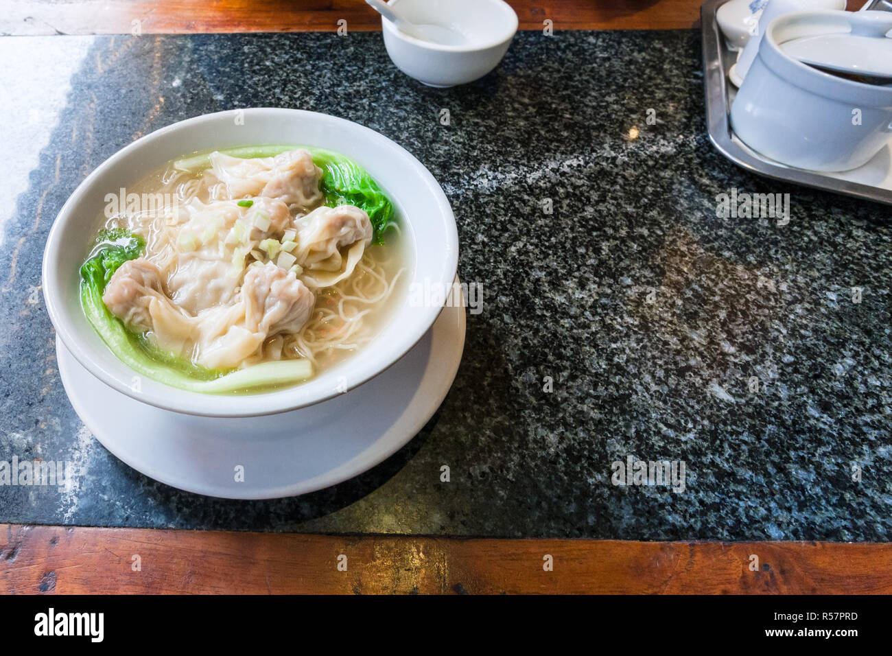 Dim sum with noodle soup in bowl Stock Photo - Alamy