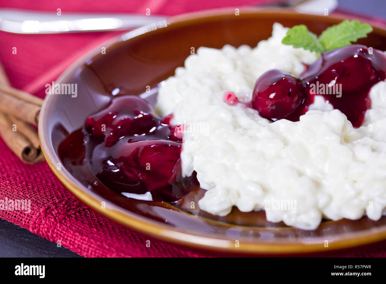 Rice pudding with cherries hi-res stock photography and images - Alamy