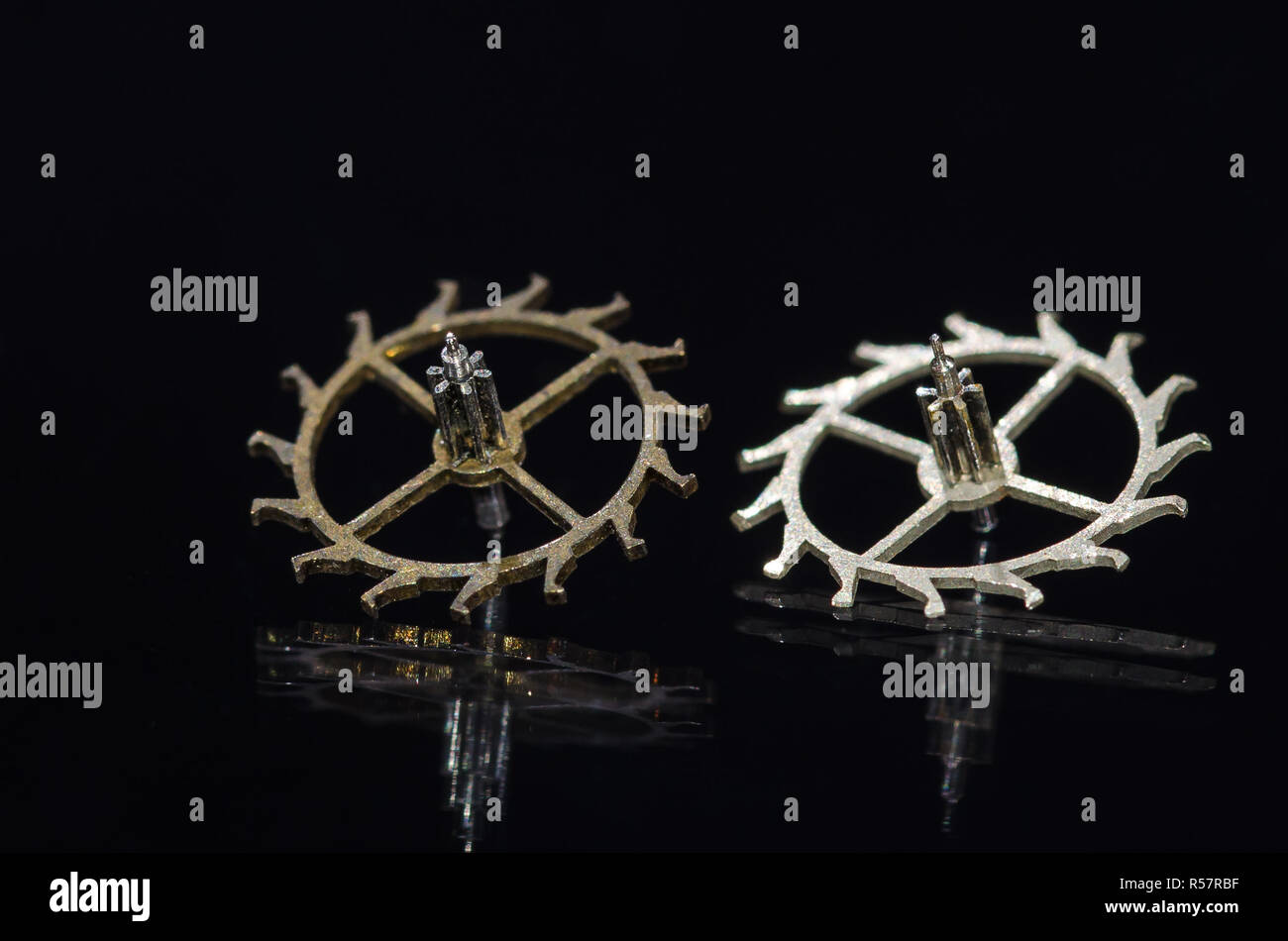 Watch Parts: Two Vintage Metallic Escape Wheels on Black Background ...