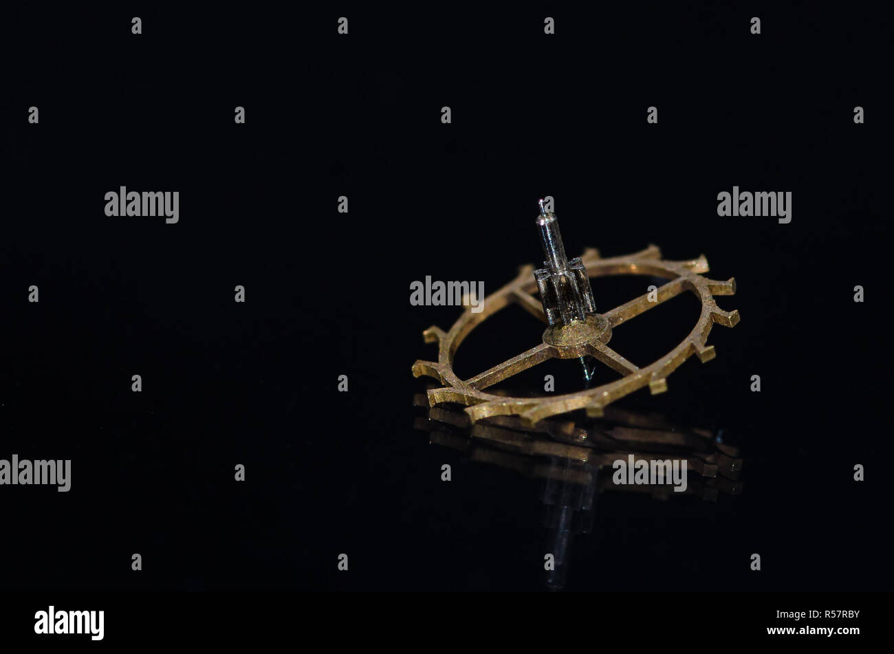 Watch Parts: Vintage Metallic Escape Wheel on Black Background Stock ...