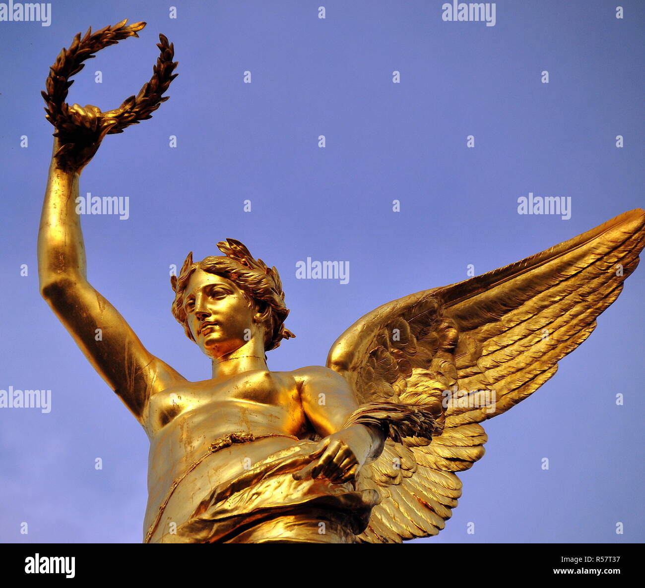 golden angel with laurel wreath on the liebenberg monument in front of ...