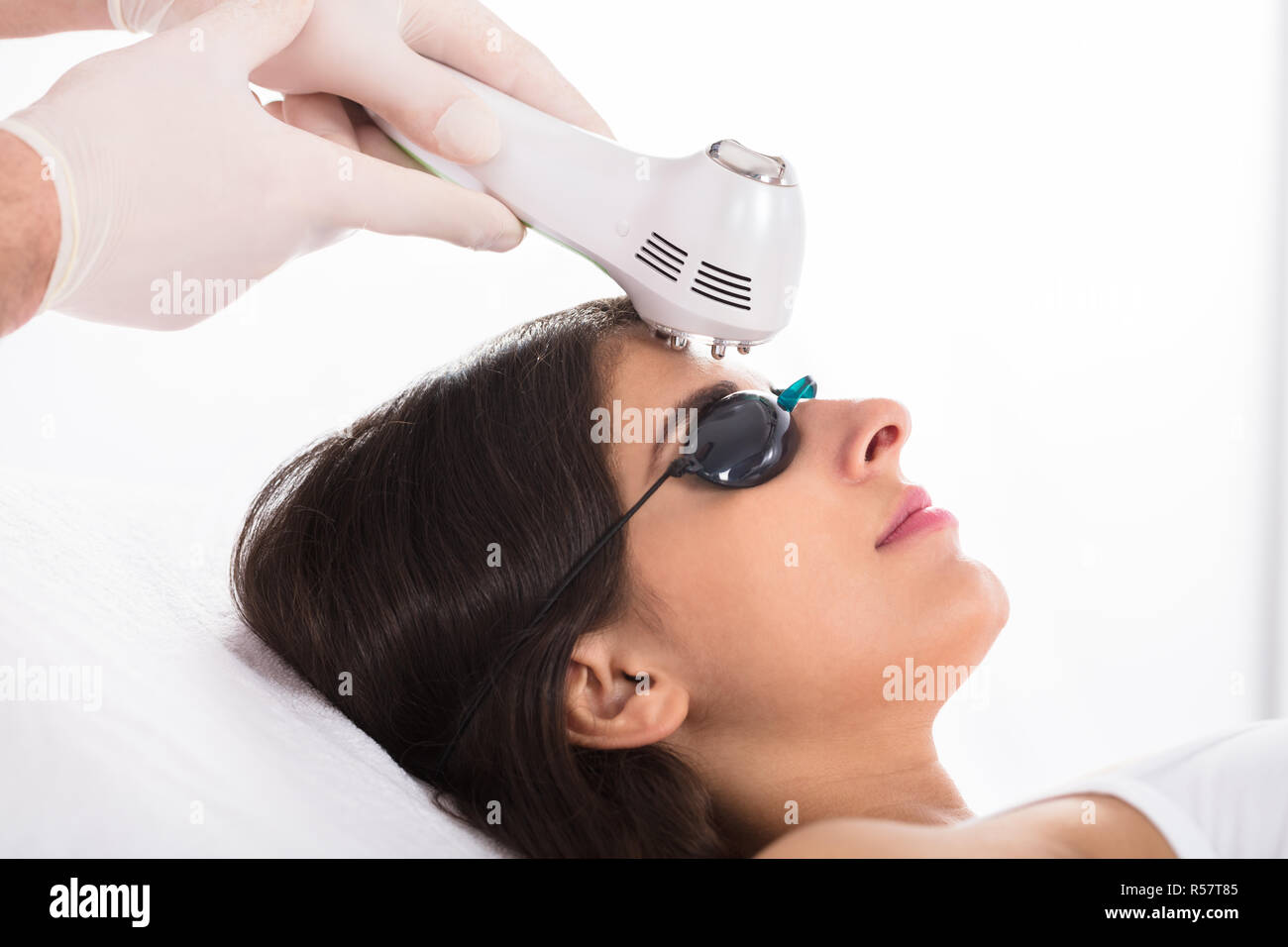 Woman Getting A Ultrasound Skin Treatment Stock Photo - Alamy