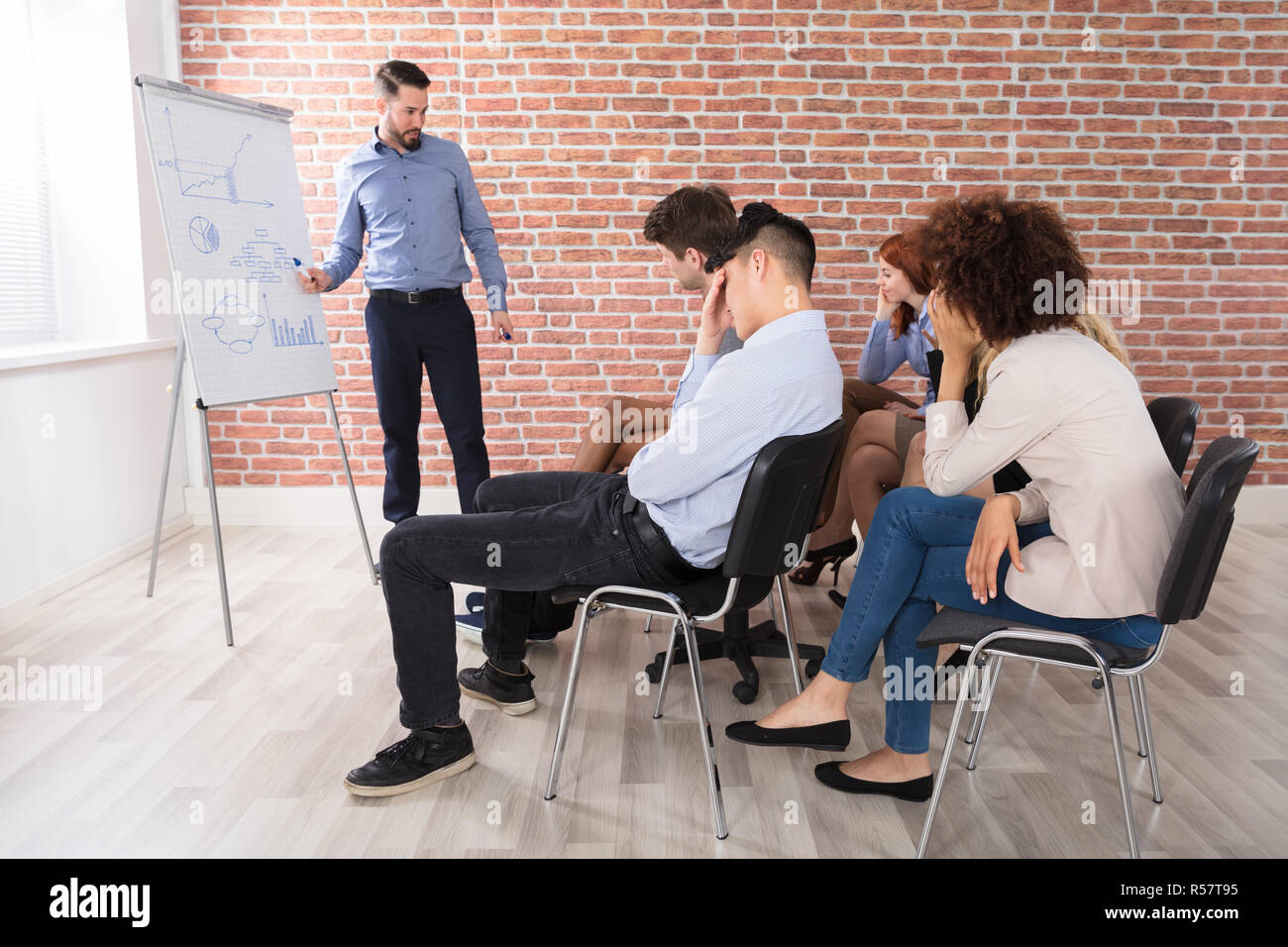 Businessman Giving Presentation Stock Photo - Alamy