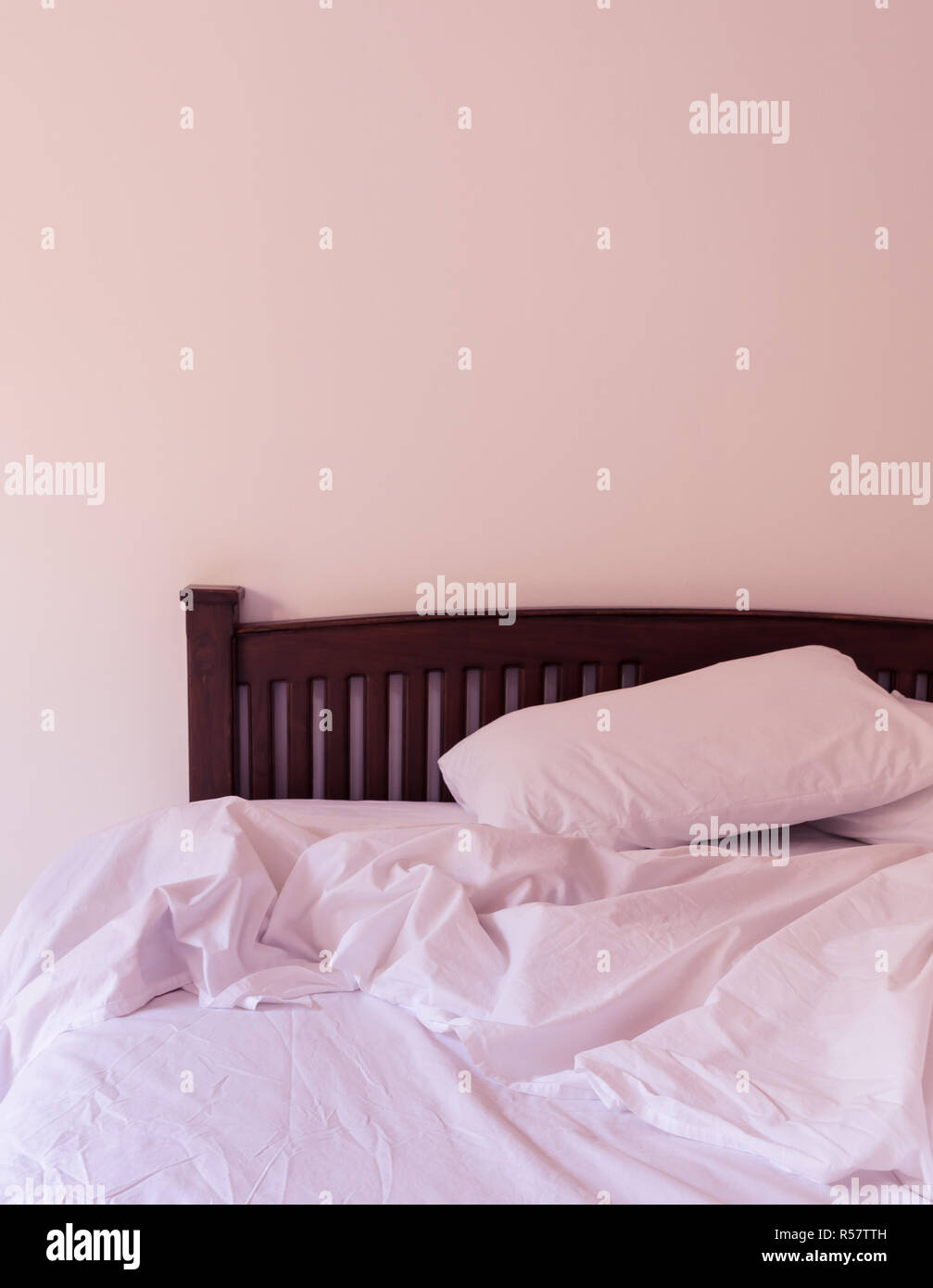 Morning view of an unmade bed Stock Photo - Alamy