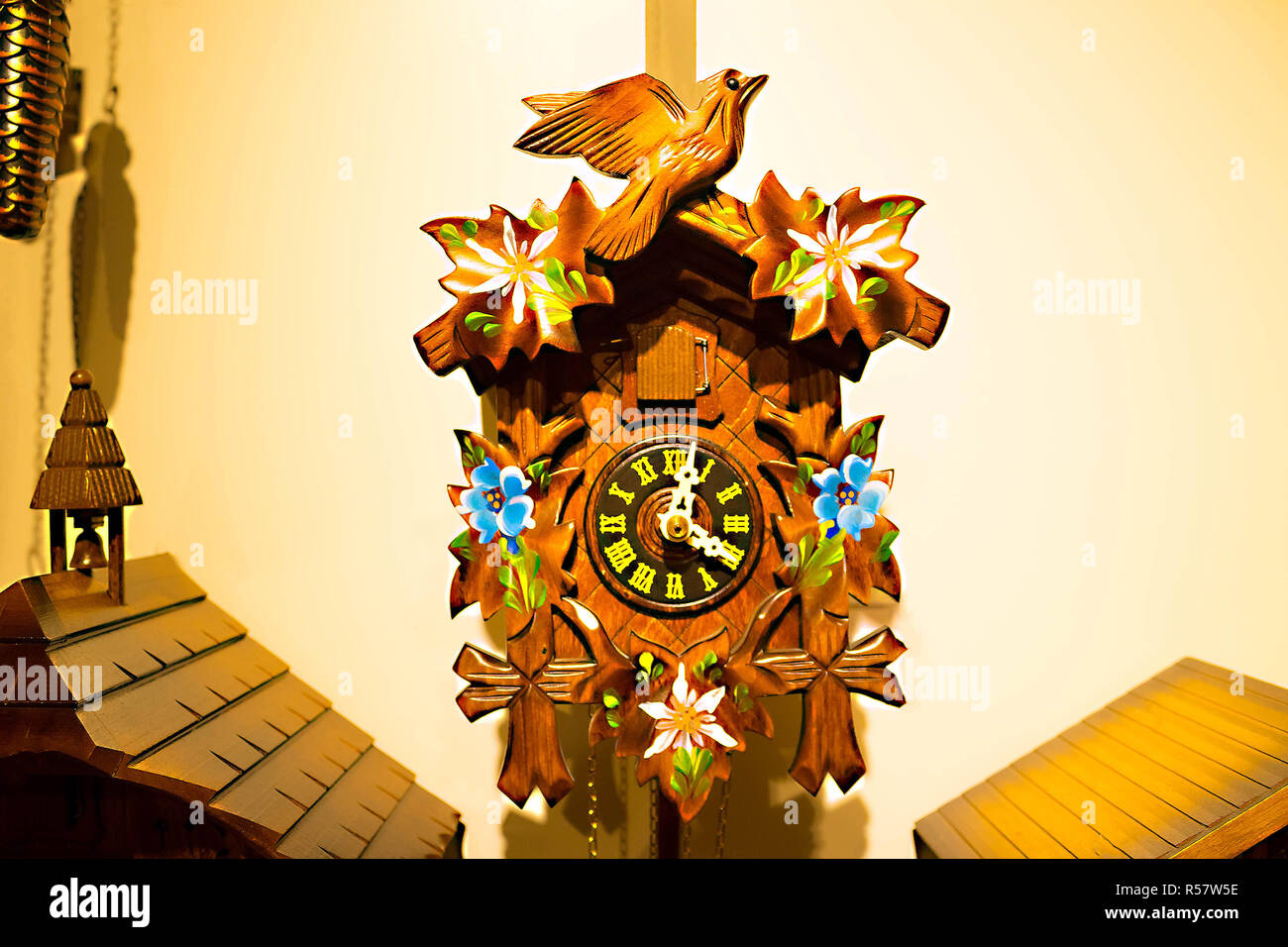 The detail of swiss wooden clock Stock Photo - Alamy