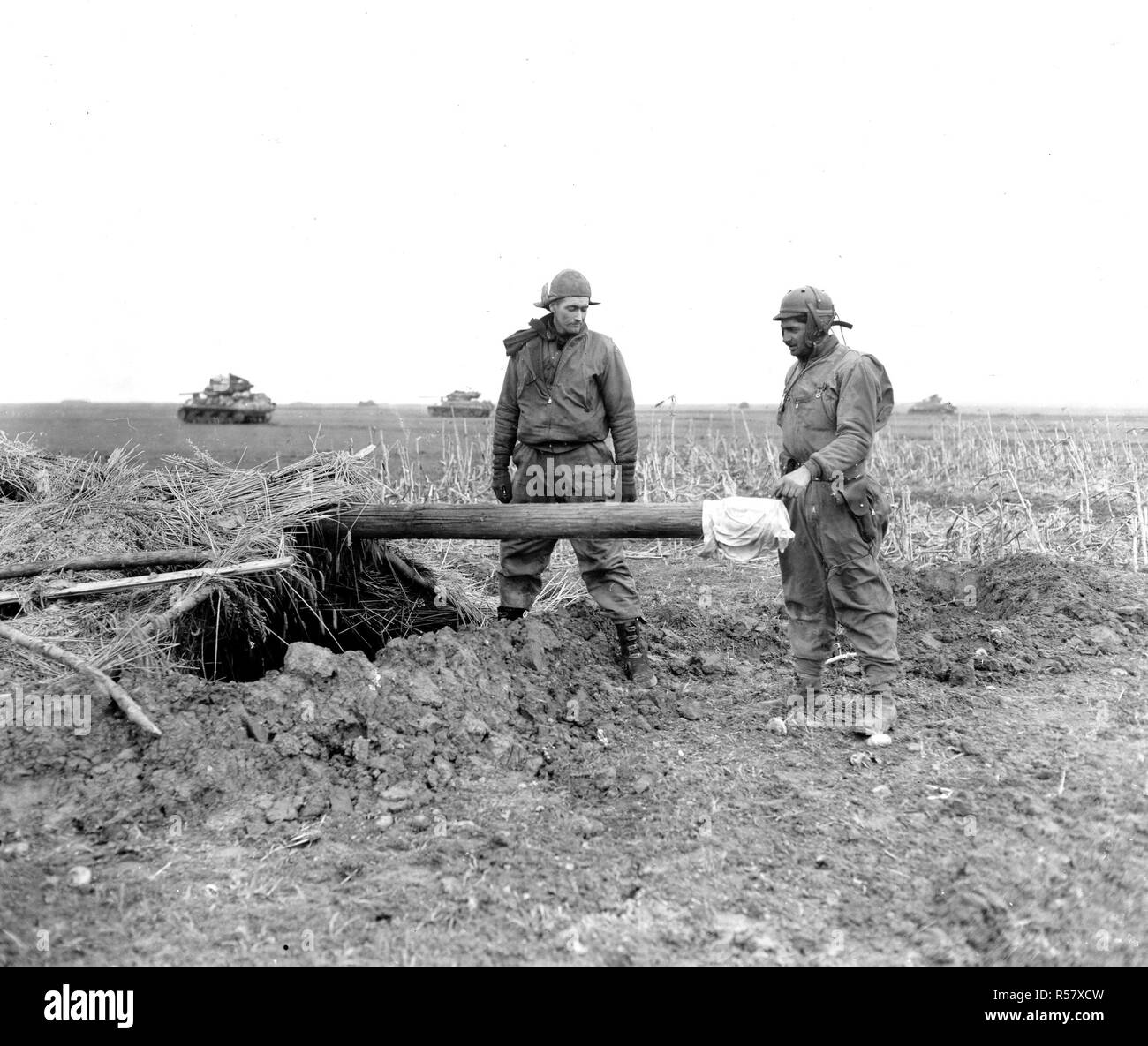 2/25/1945 - Original caption: This pole camouflaged as a gun was left ...