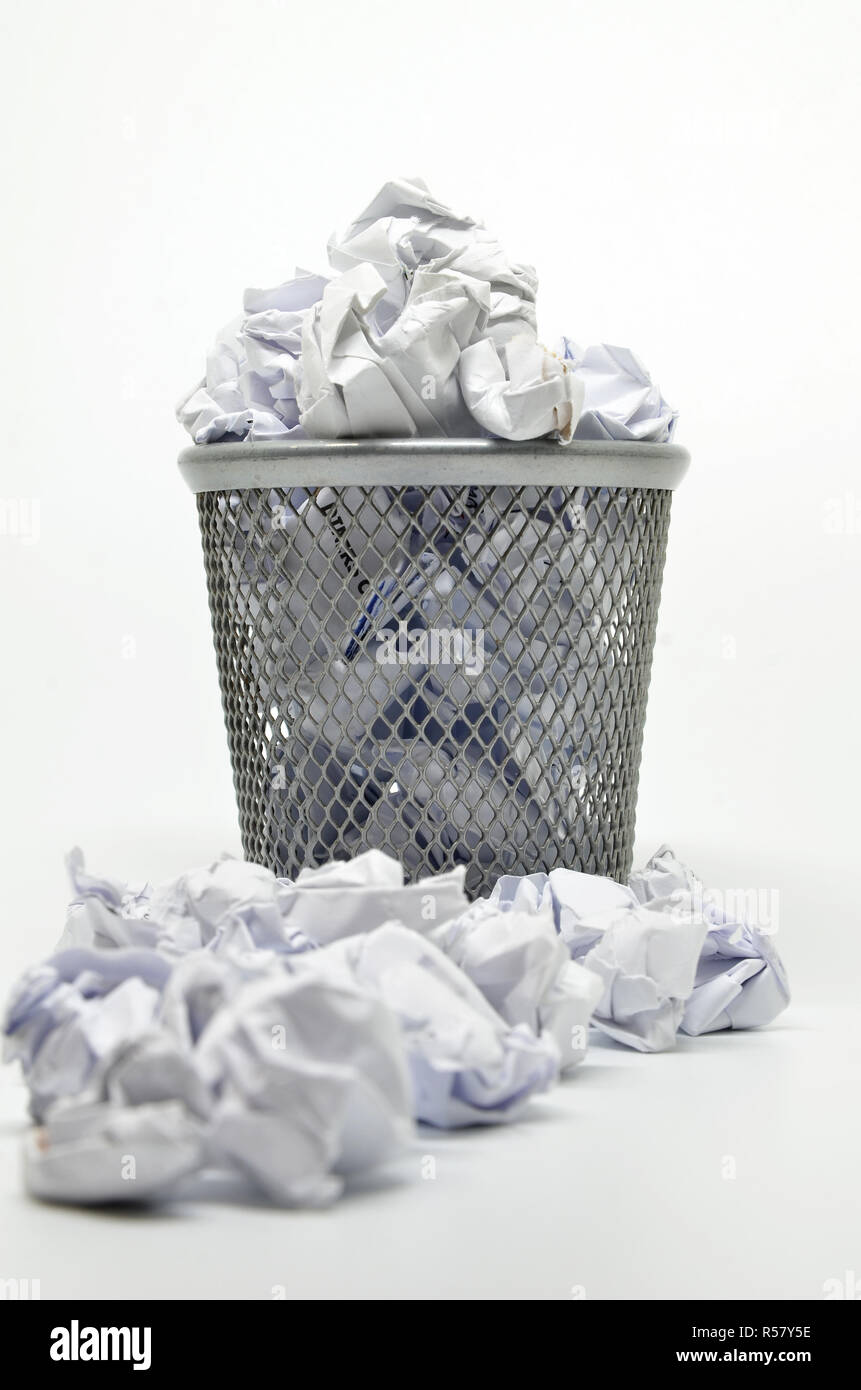 Garbage bin with paper waste Stock Photo - Alamy