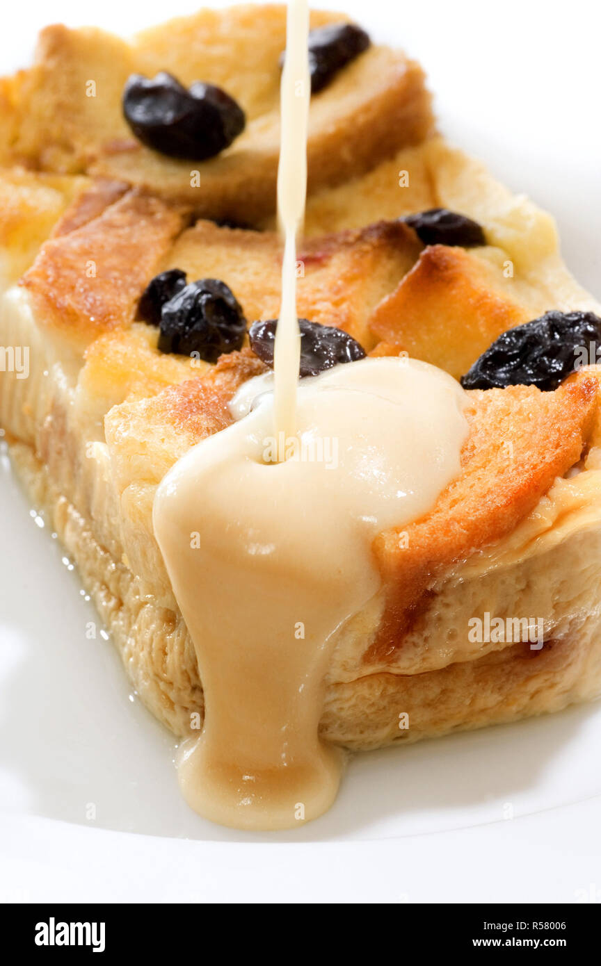 Bread Pudding Covered with Fla Drop Stock Photo - Alamy