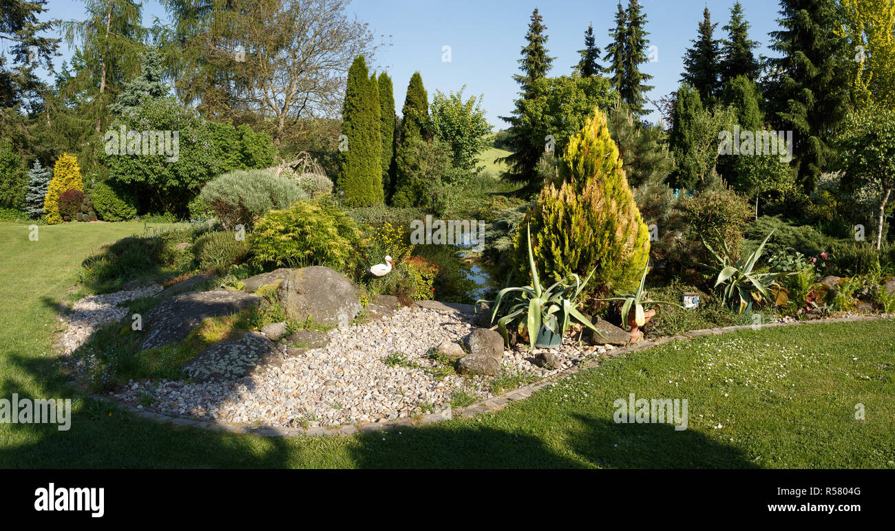 colorful spring garden Stock Photo - Alamy