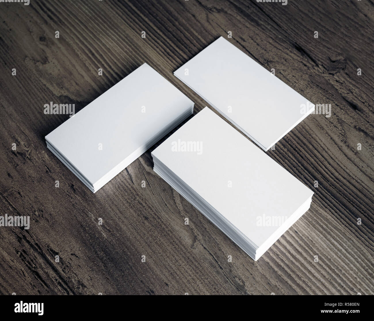 Three stacks of business cards Stock Photo - Alamy
