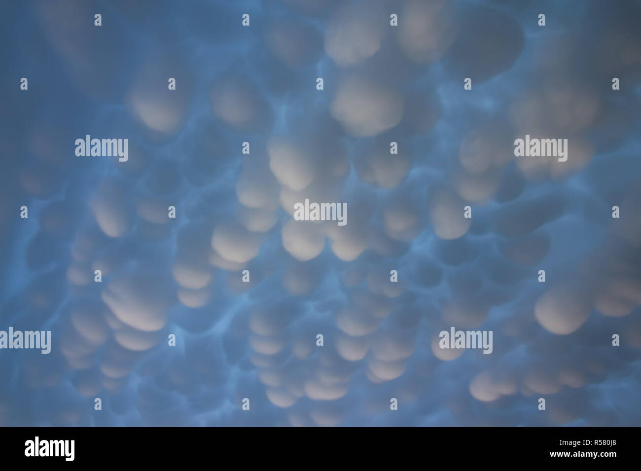 Mammatus clouds fill the sky after a passing supercell thunderstorm ...