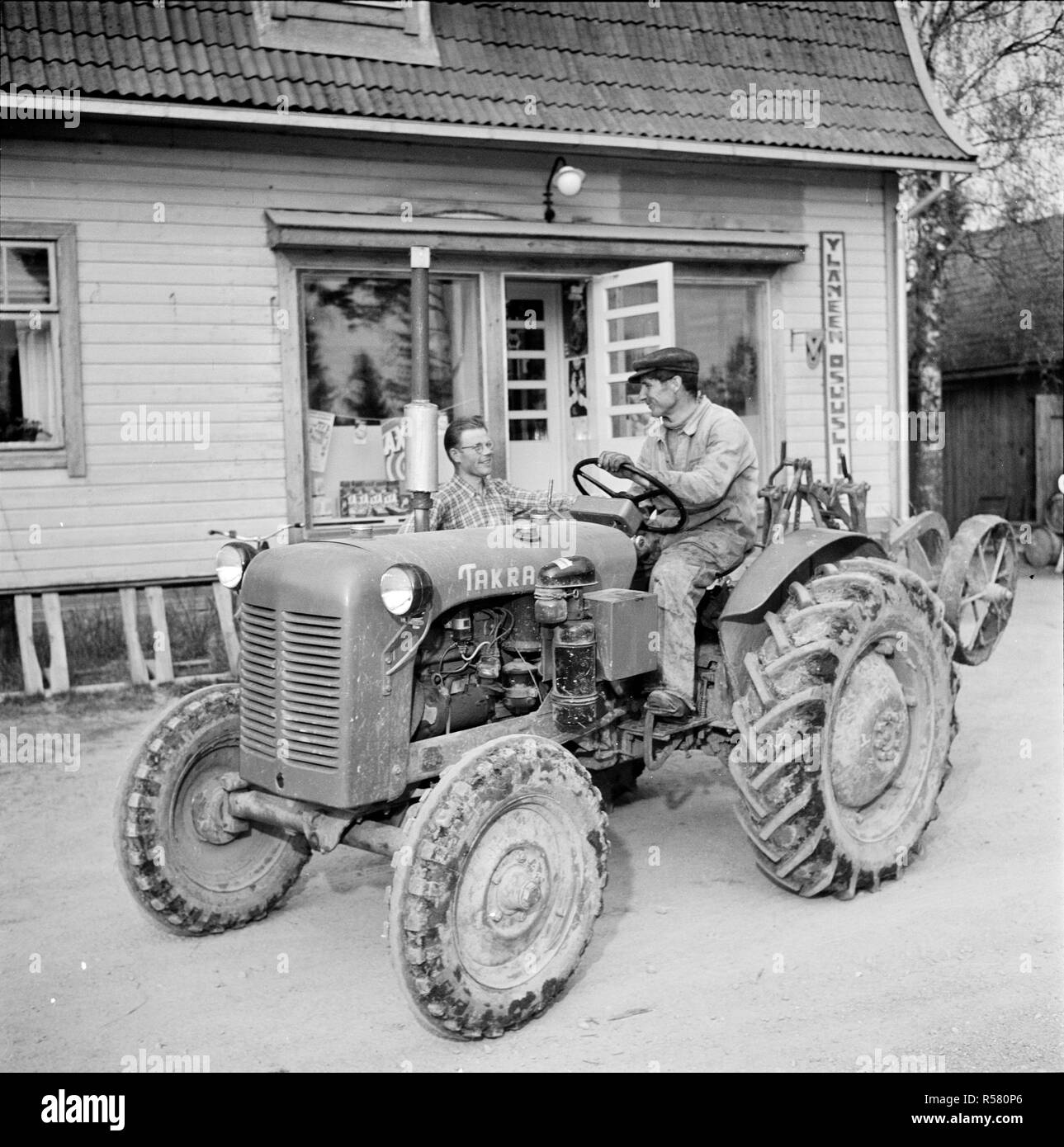 Finland History - A Finnish Farmer works with a tractor at the Yllänen ...