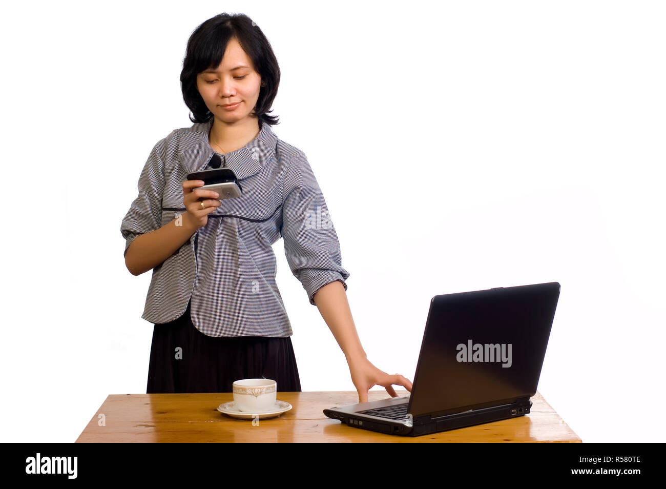 Business Woman Sending SMS on Cell Phone Stock Photo - Alamy