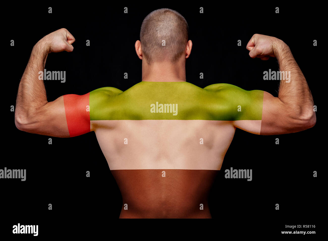 The back of a young athletic man wearing a t-shirt with the national ...