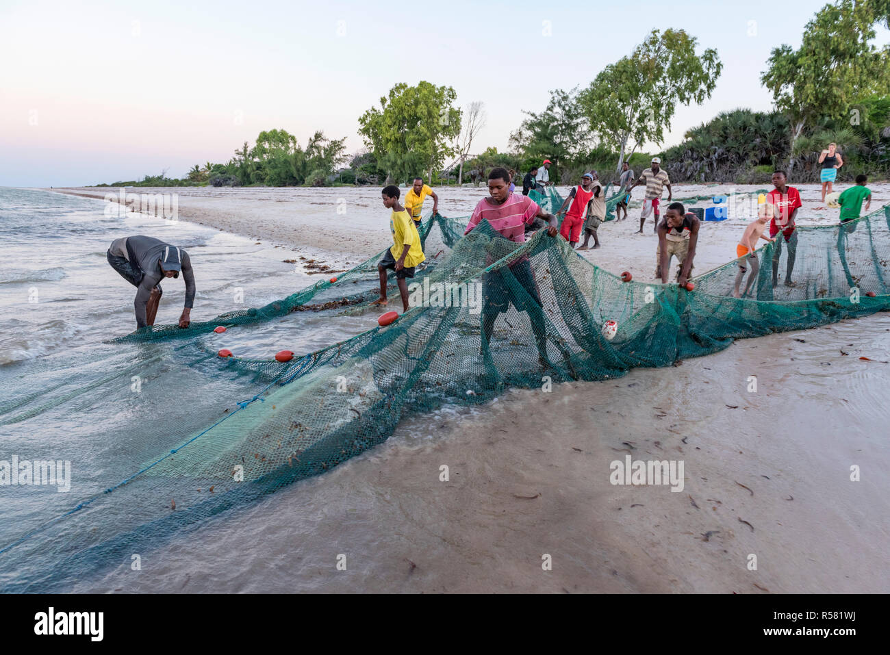 Fishermen Hauling In Nets Sea Stock Photos & Fishermen Hauling In Nets ...