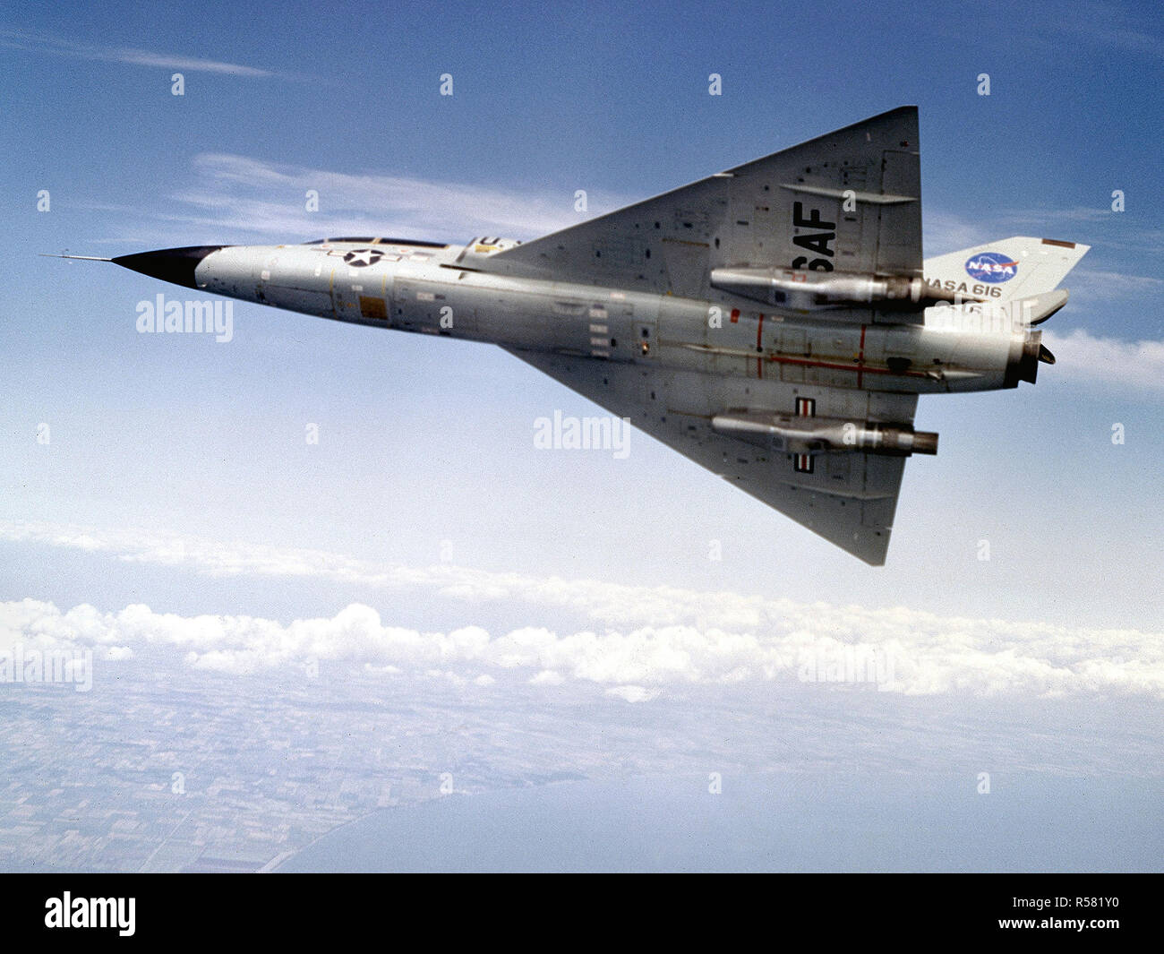 A Convair F-106B Delta Dart rolls to the right to reveal the two ...