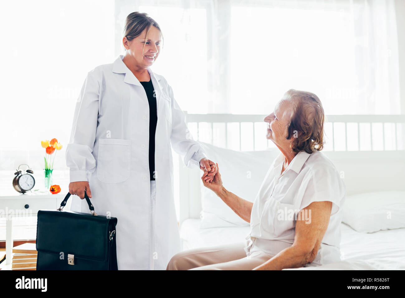 Gp home visit hi-res stock photography and images - Alamy