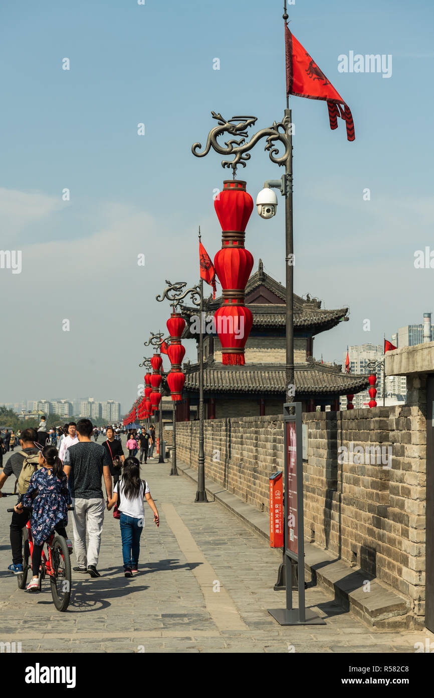 View of Xian city wall ramparts with modern city in background Stock ...