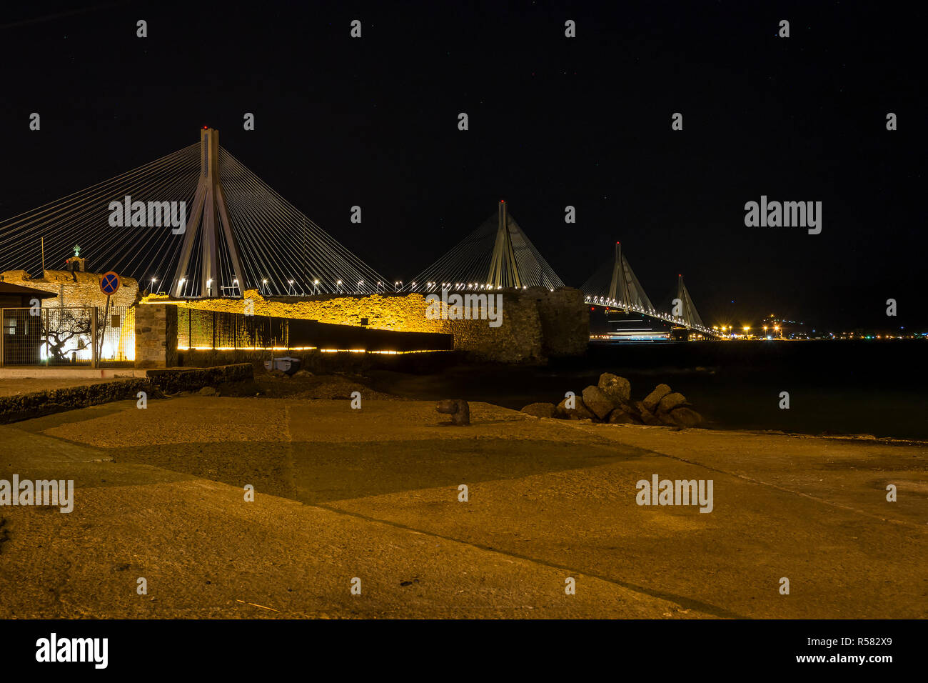 View of Rio-Antirio bridge at night, Greece. The Rio Antirrio Bridge is ...