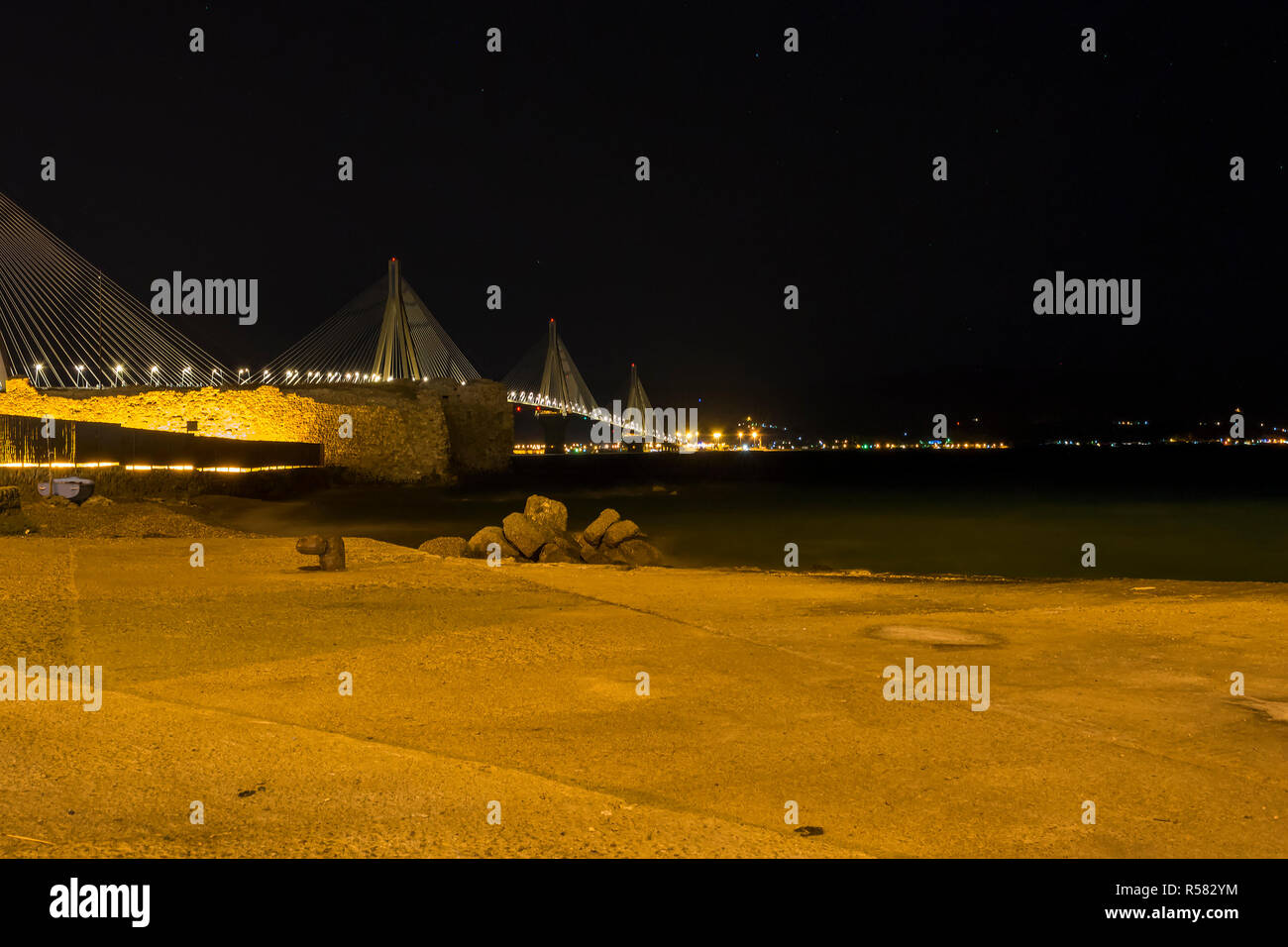 View of Rio-Antirio bridge at night, Greece. The Rio Antirrio Bridge is ...