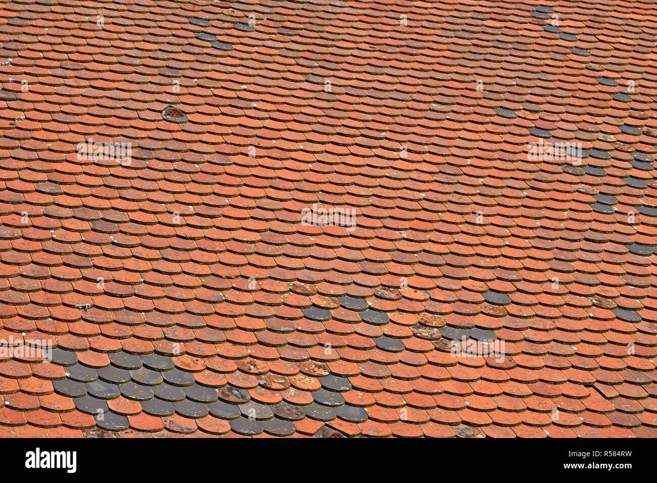 Old weathered red brown ceramic roof tiles Stock Photo - Alamy