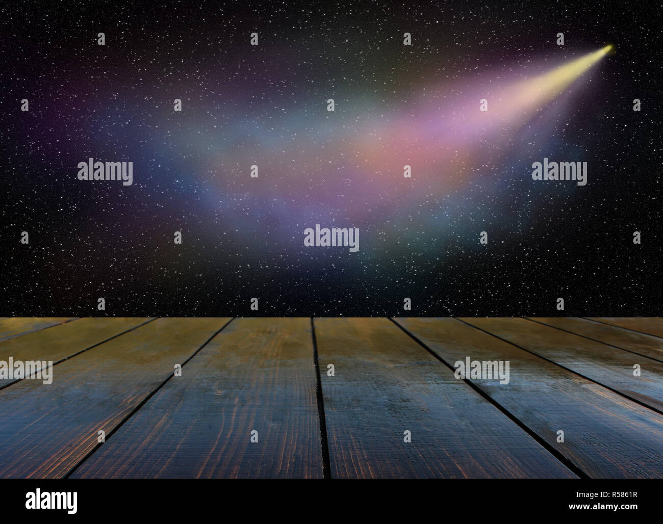 Comet flies in the darkness of outer space Stock Photo - Alamy