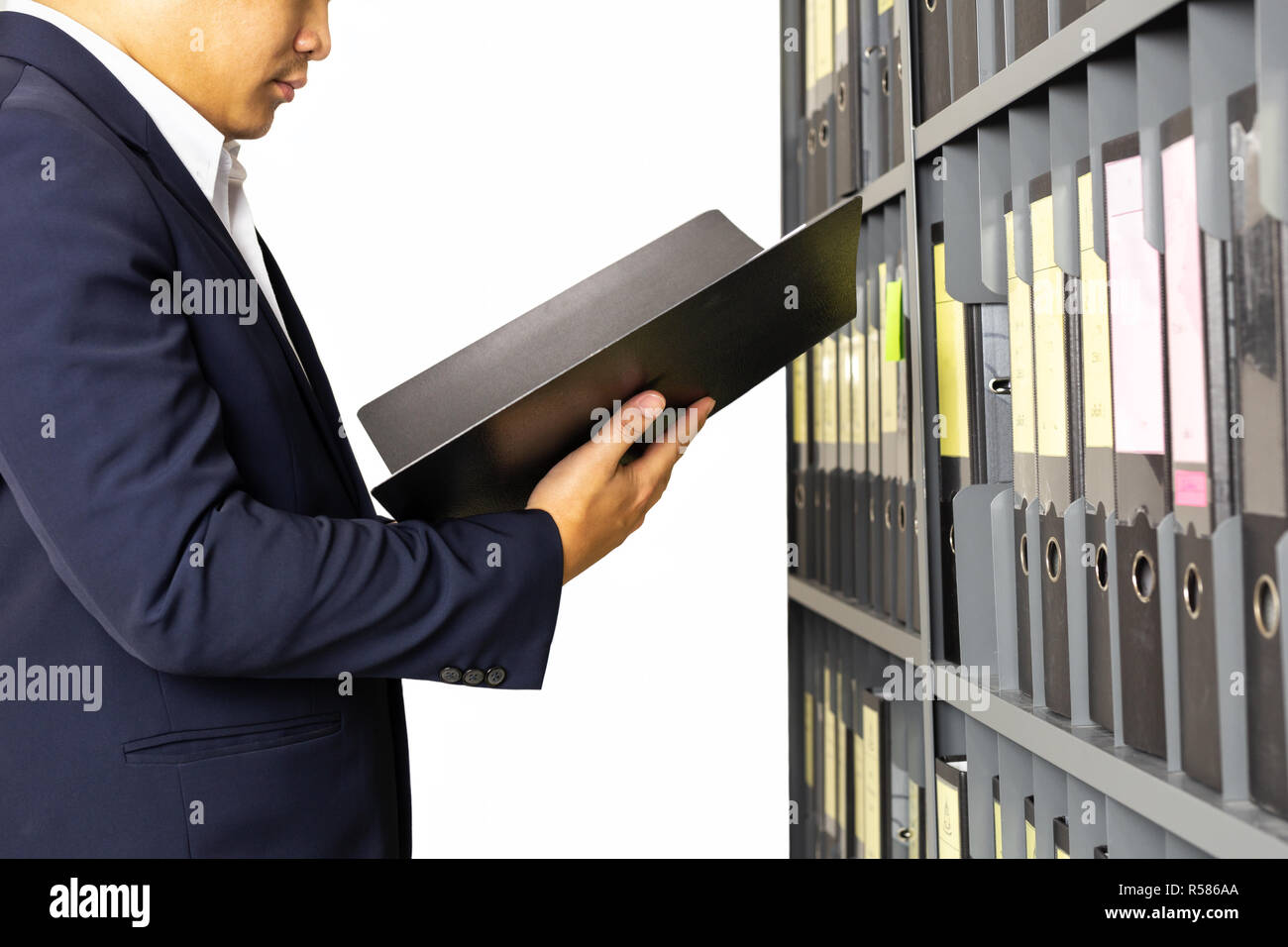 Businessman holding documents file folder from office shelf isolated ...