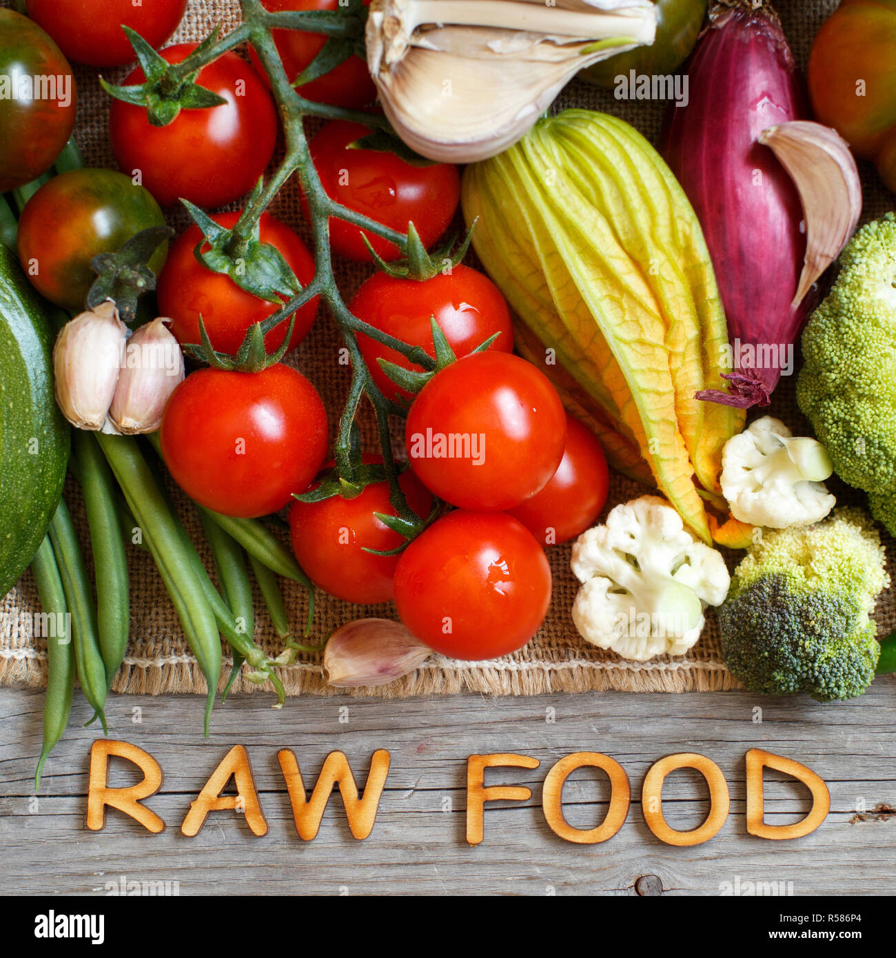 Fresh vegetables and wooden letters RAW FOOD Stock Photo - Alamy
