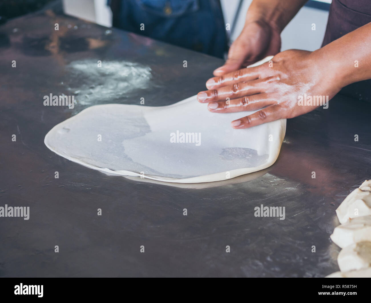 Roti Making, roti thresh flour by roti maker with oil. Indian ...