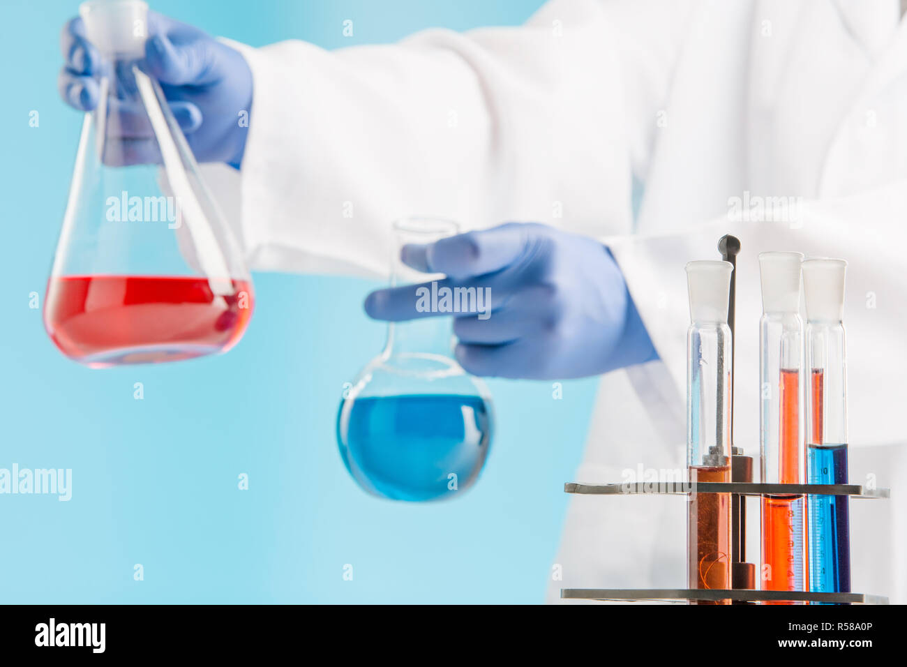 Experiments in a chemistry lab. conducting an experiment in the ...