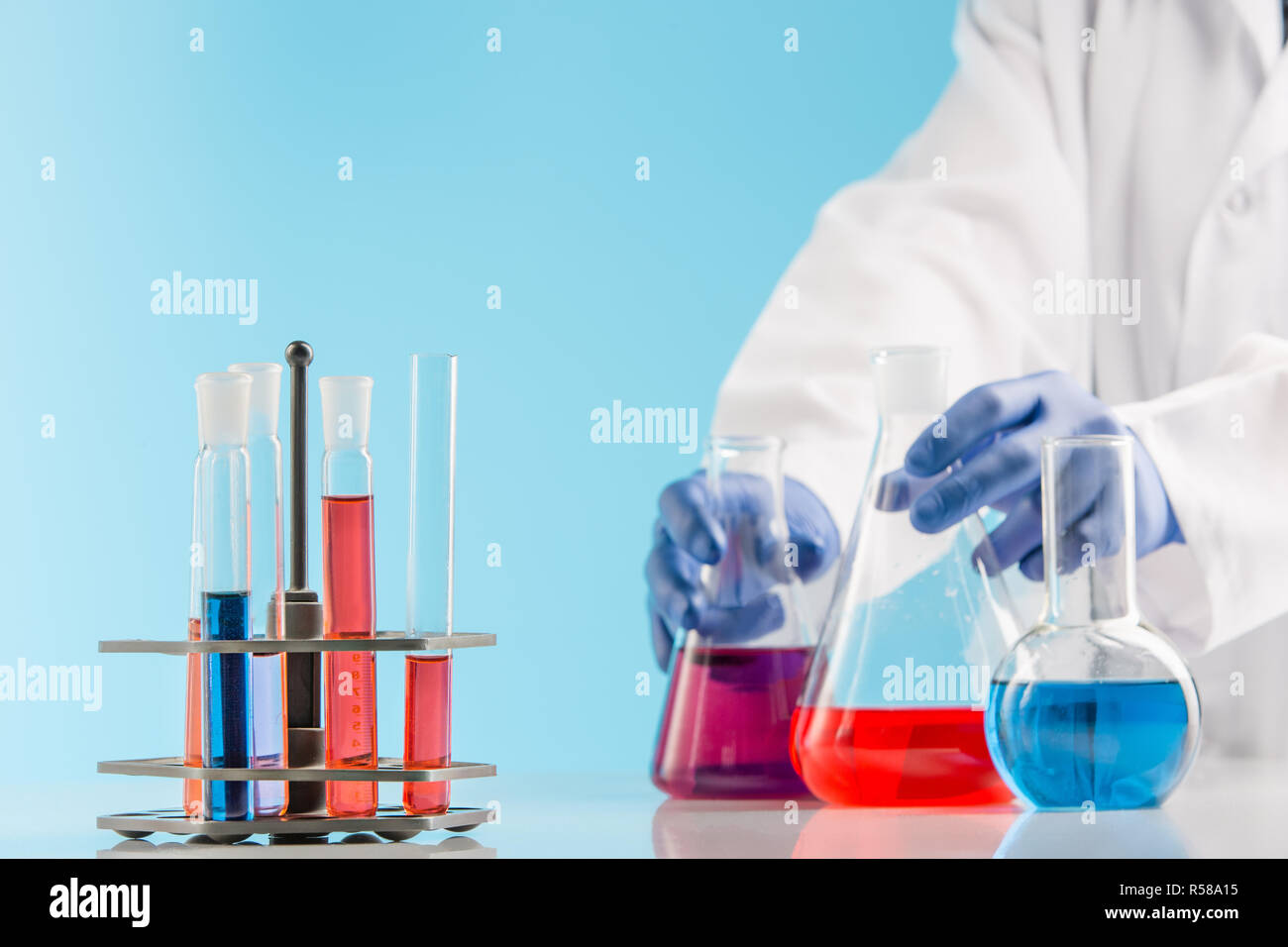 Experiments in a chemistry lab. conducting an experiment in the ...