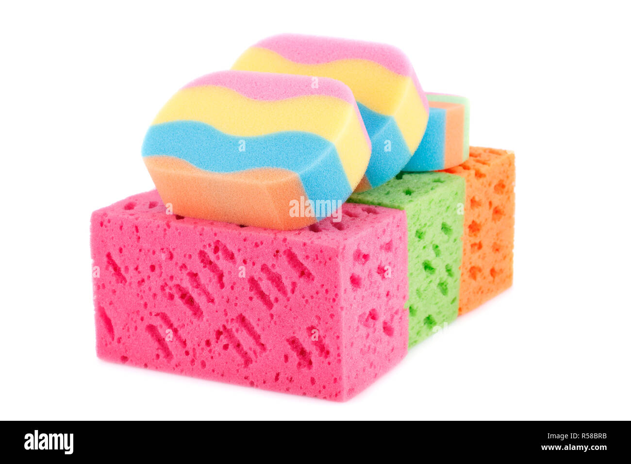 Colorful sponges isolated on white background Stock Photo - Alamy