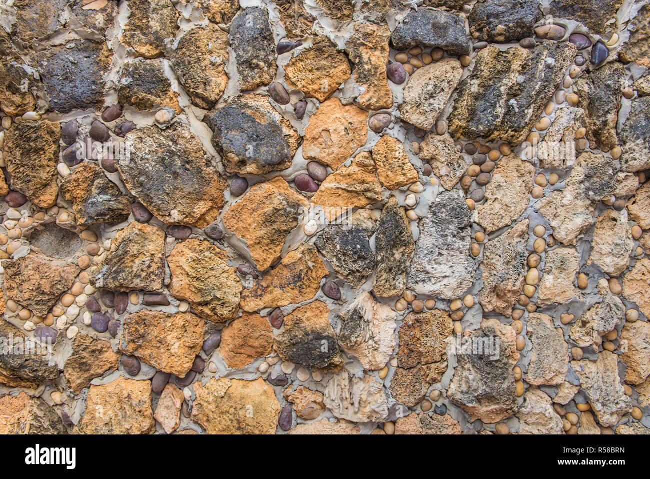 Background of stone wall texture abstract for design Stock Photo - Alamy