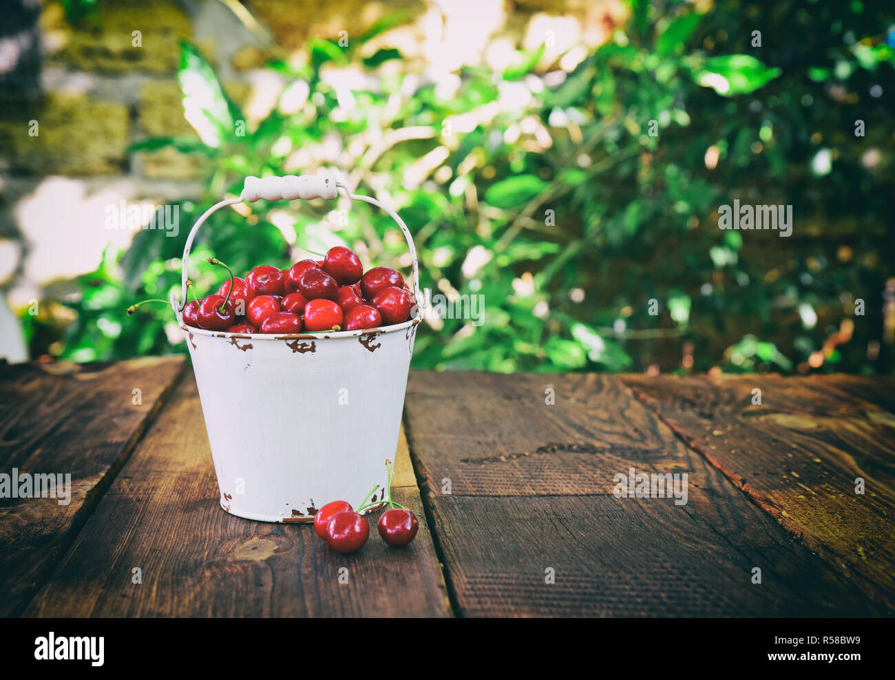 Cherry in a bucket hi-res stock photography and images - Alamy