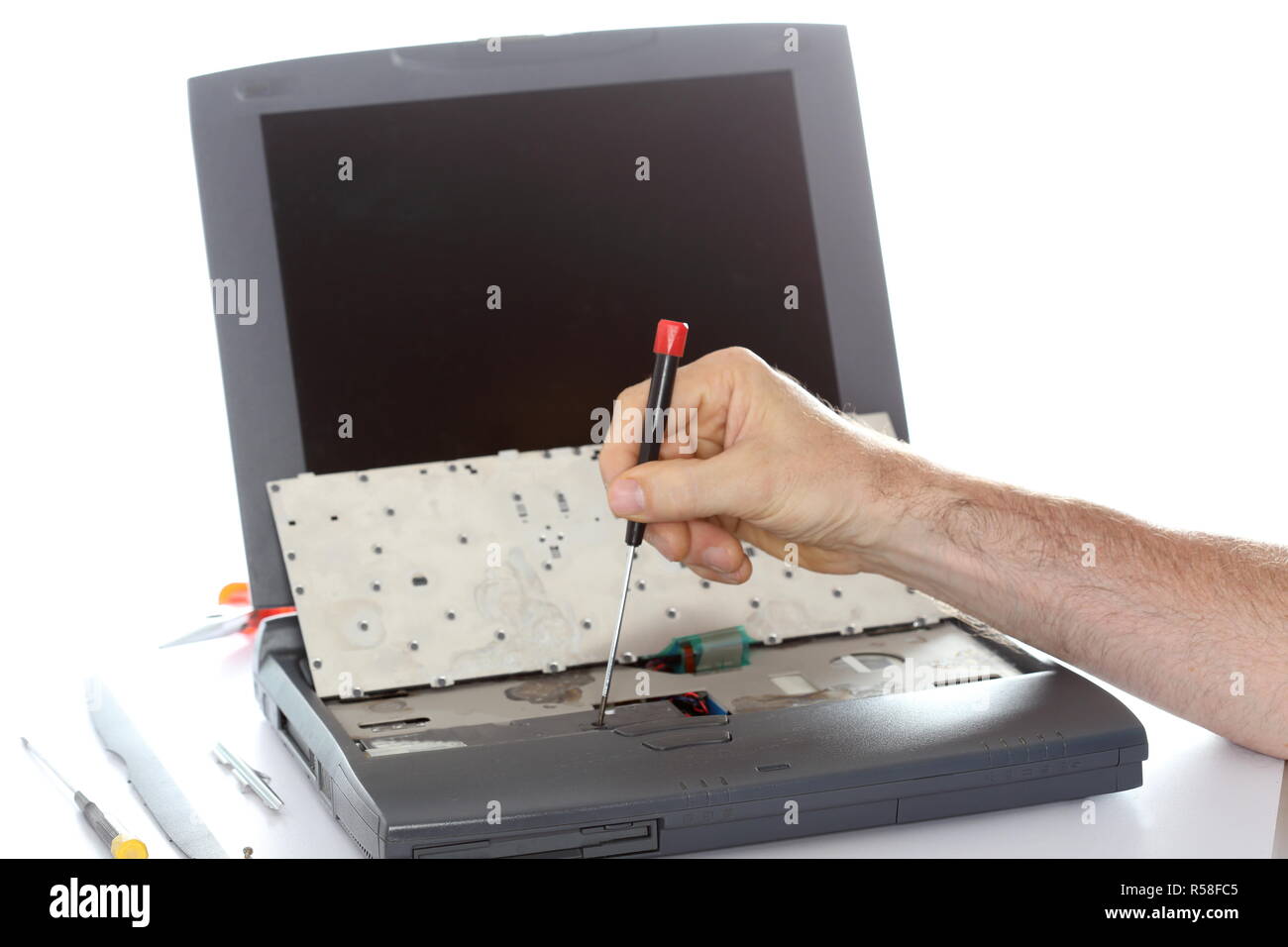 repair portable computer Stock Photo - Alamy