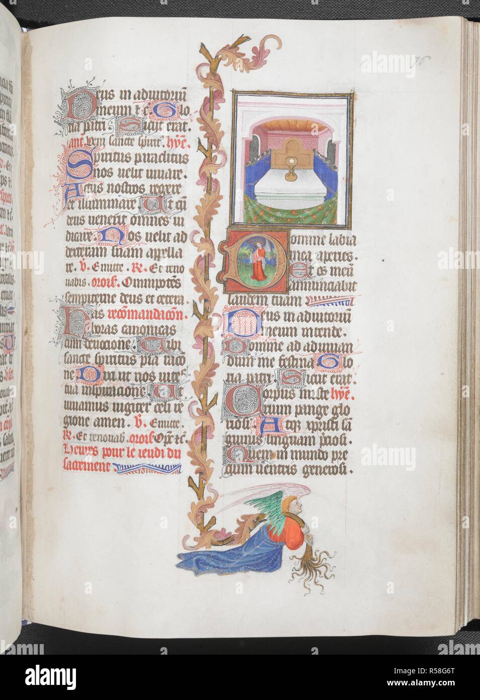The Host and an historiated initial 'D', with partial foliate border ...