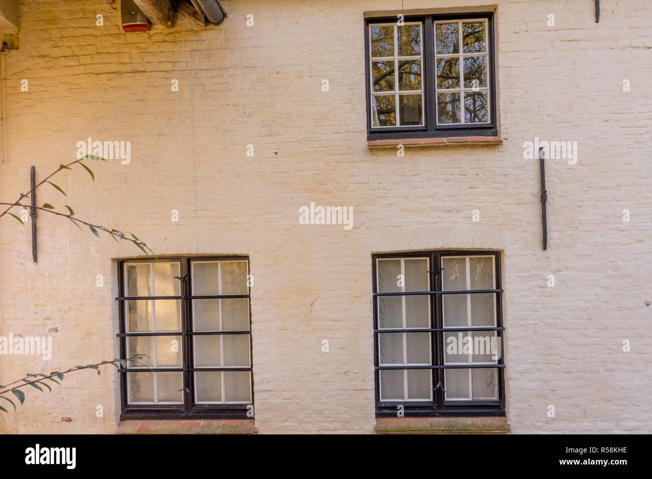 Belgium, Bruges, a glass window against white wall Stock Photo - Alamy