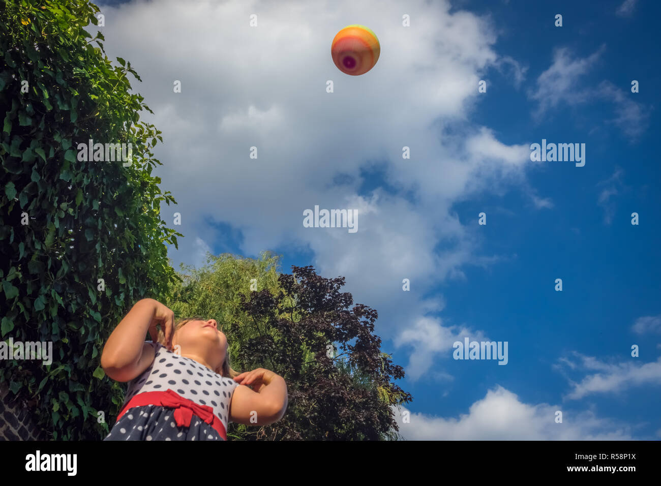 Girl bouncing ball hi-res stock photography and images - Alamy