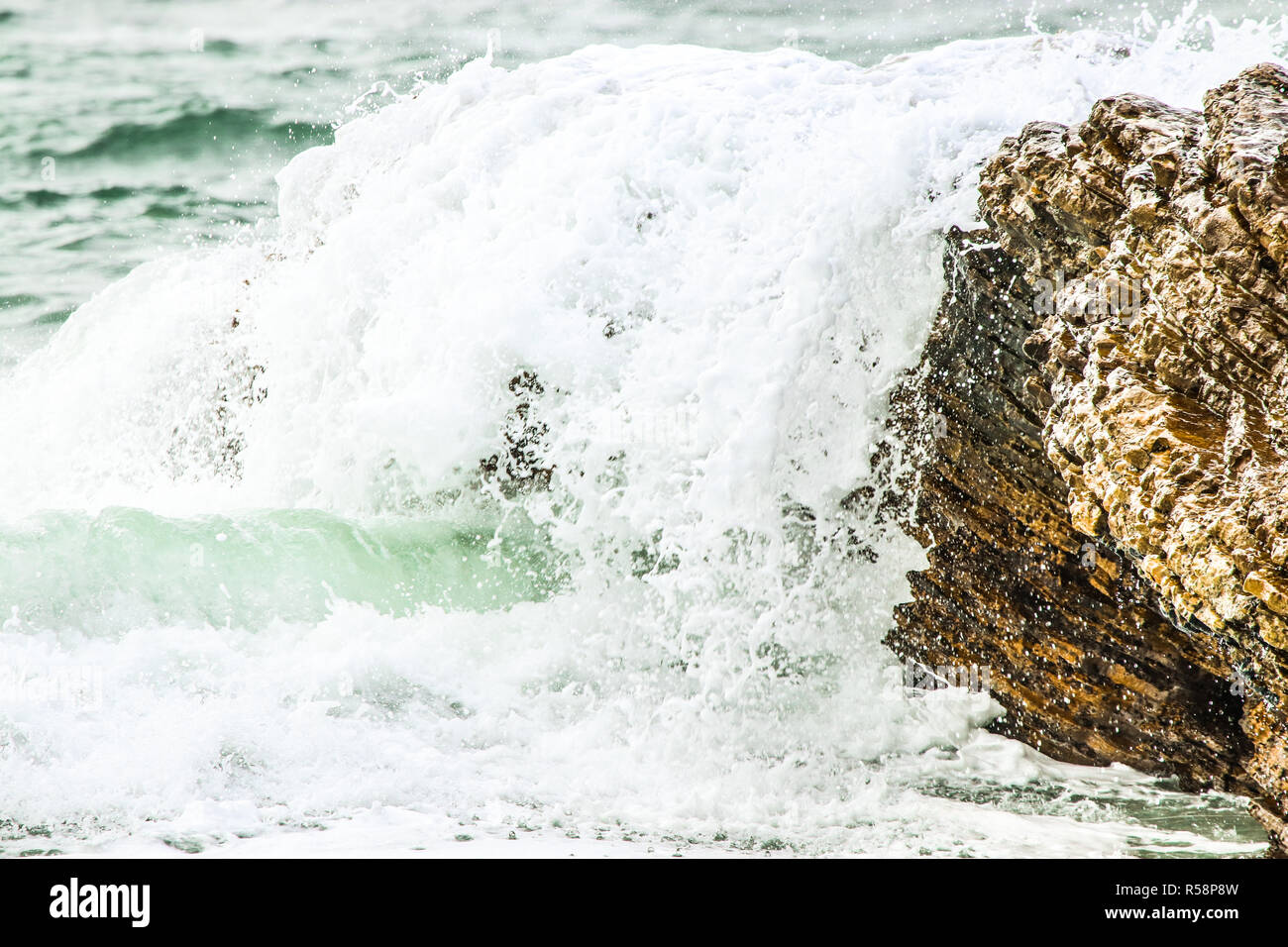Water over a rock Stock Photo - Alamy