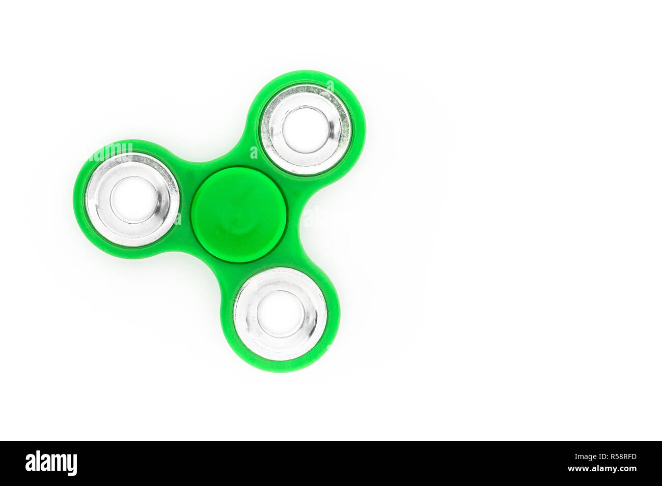 Green finger spinner Stock Photo - Alamy