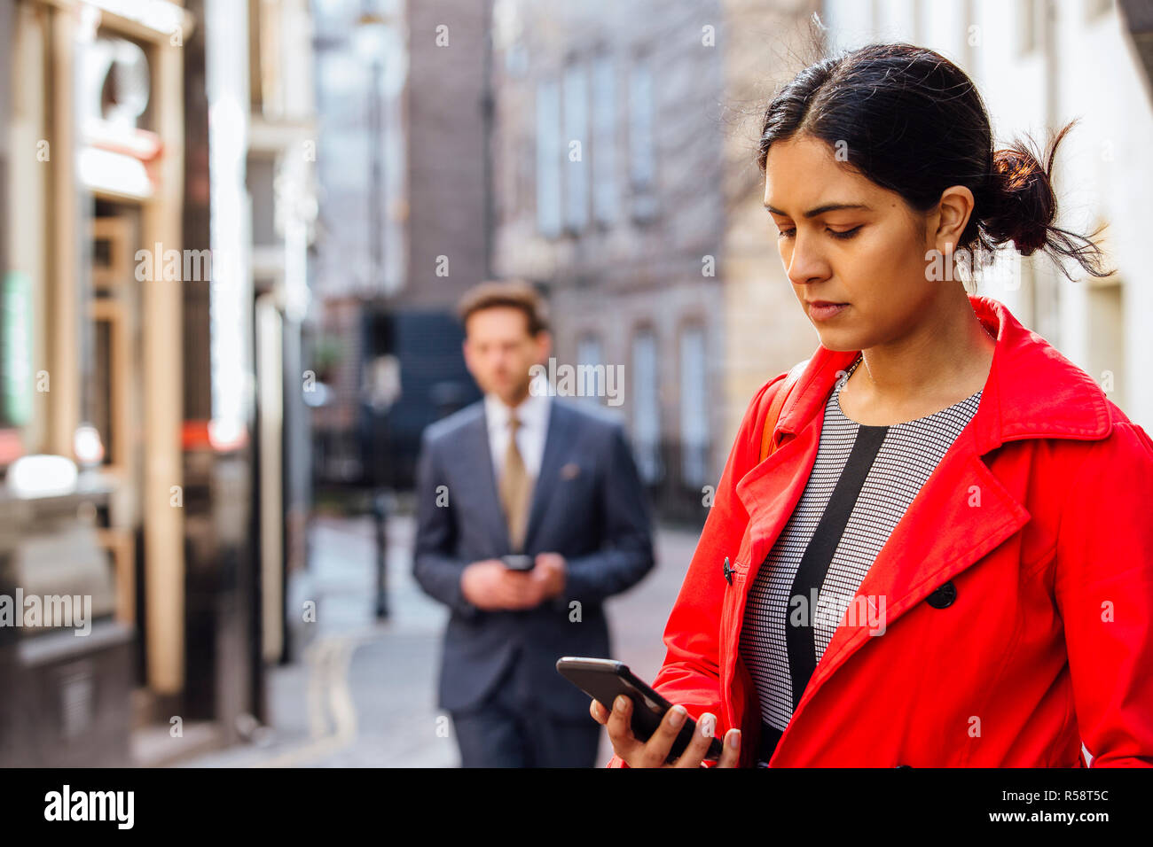 Business people Using Smartphones Stock Photo - Alamy