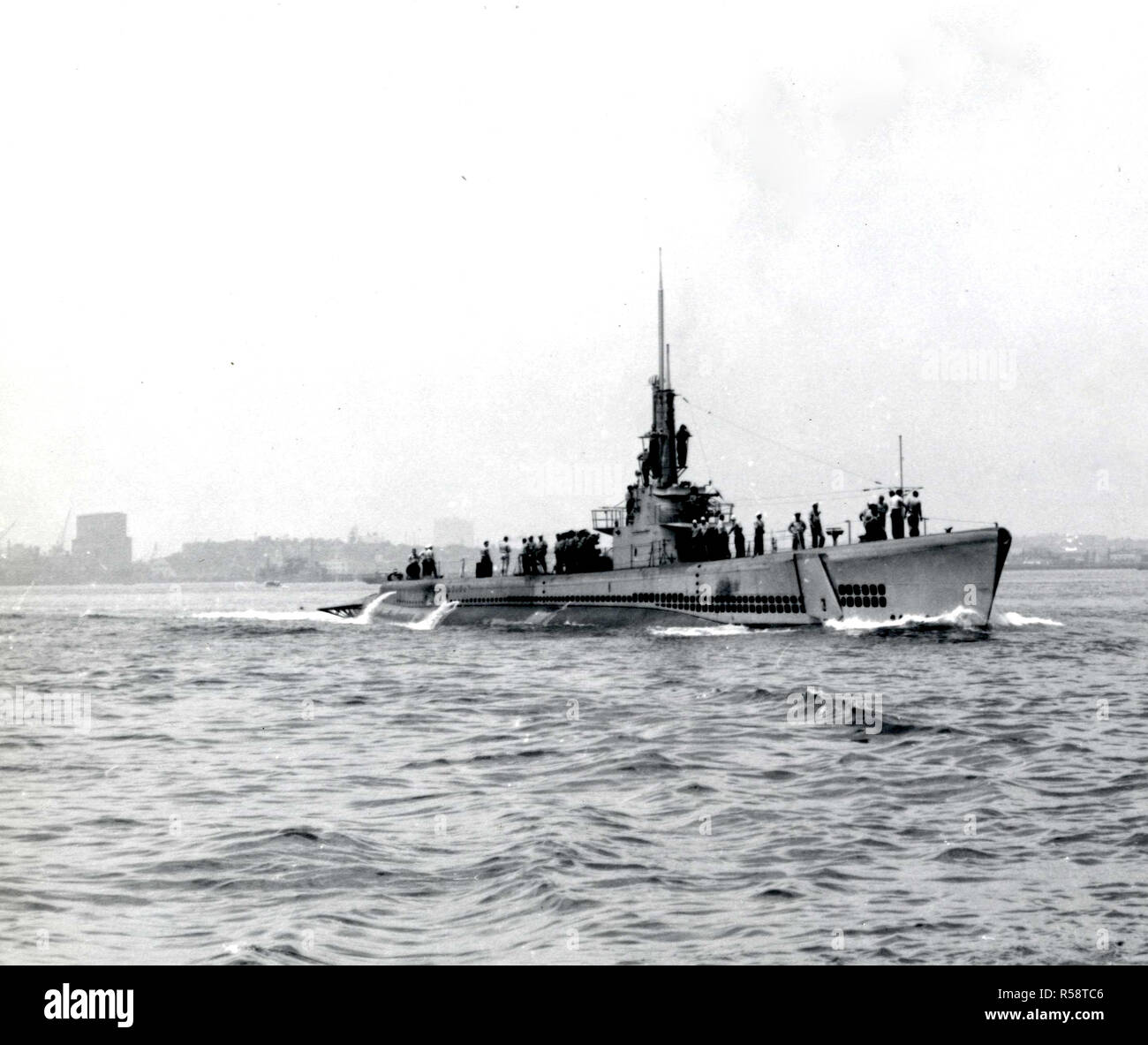 This photograph shows the SS-297 USS Ling which was built by the Boston ...