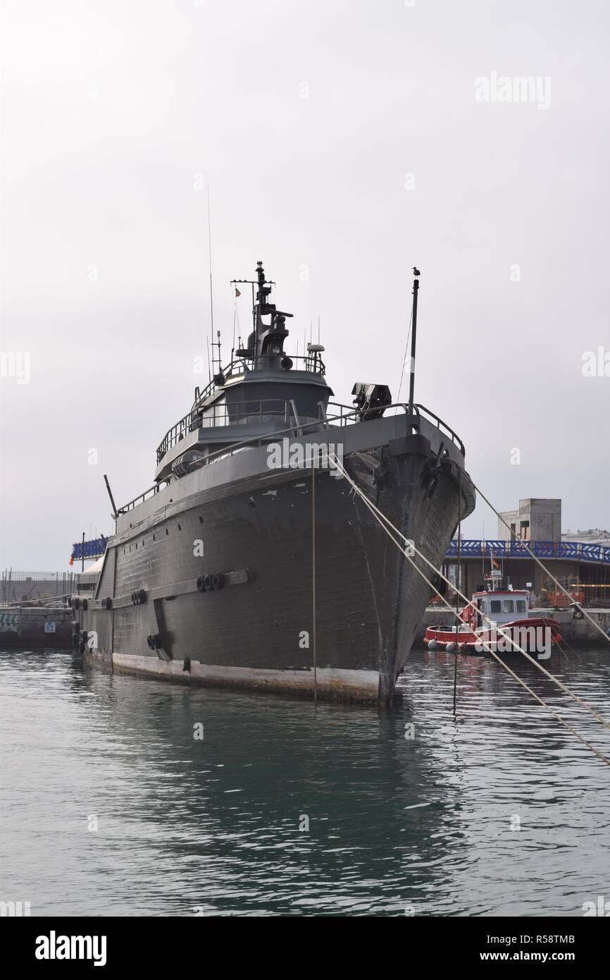 old warship at anchor in the harbor,the sky full of clouds Stock Photo ...