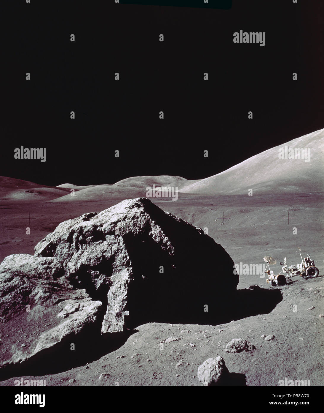In this Apollo 17 onboard photo, a Lunar Roving Vehicle (LRV) is parked ...
